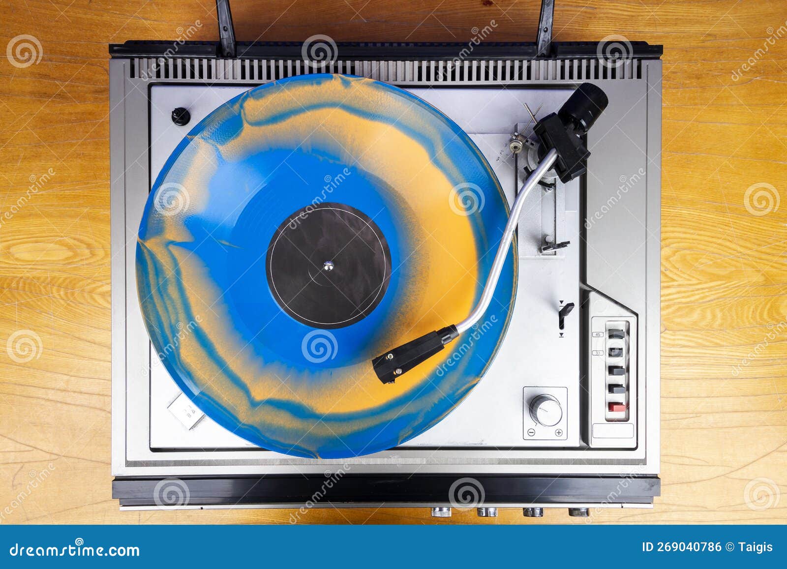 Vintage Turntable Vinyl Record Player with Blue and Orange Vinyl Stock ...