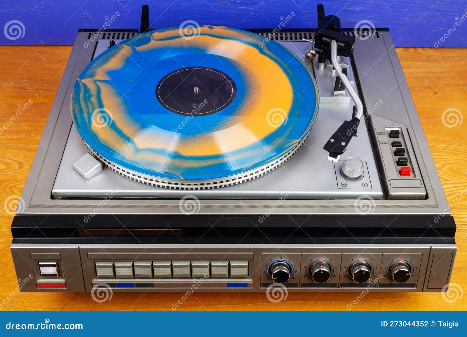Vintage Turntable Vinyl Record Player with Blue and Orange Vinyl Stock ...