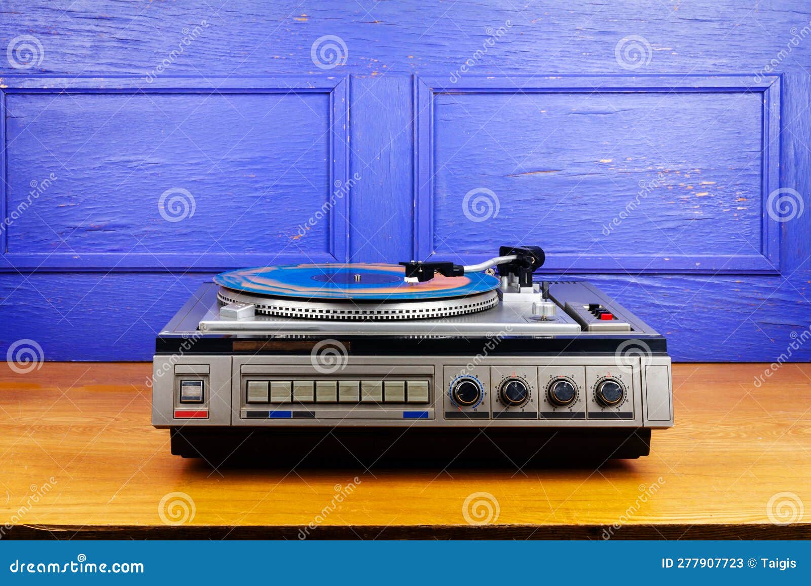 Vintage Turntable Vinyl Record Player with Blue and Orange Vinyl Stock ...