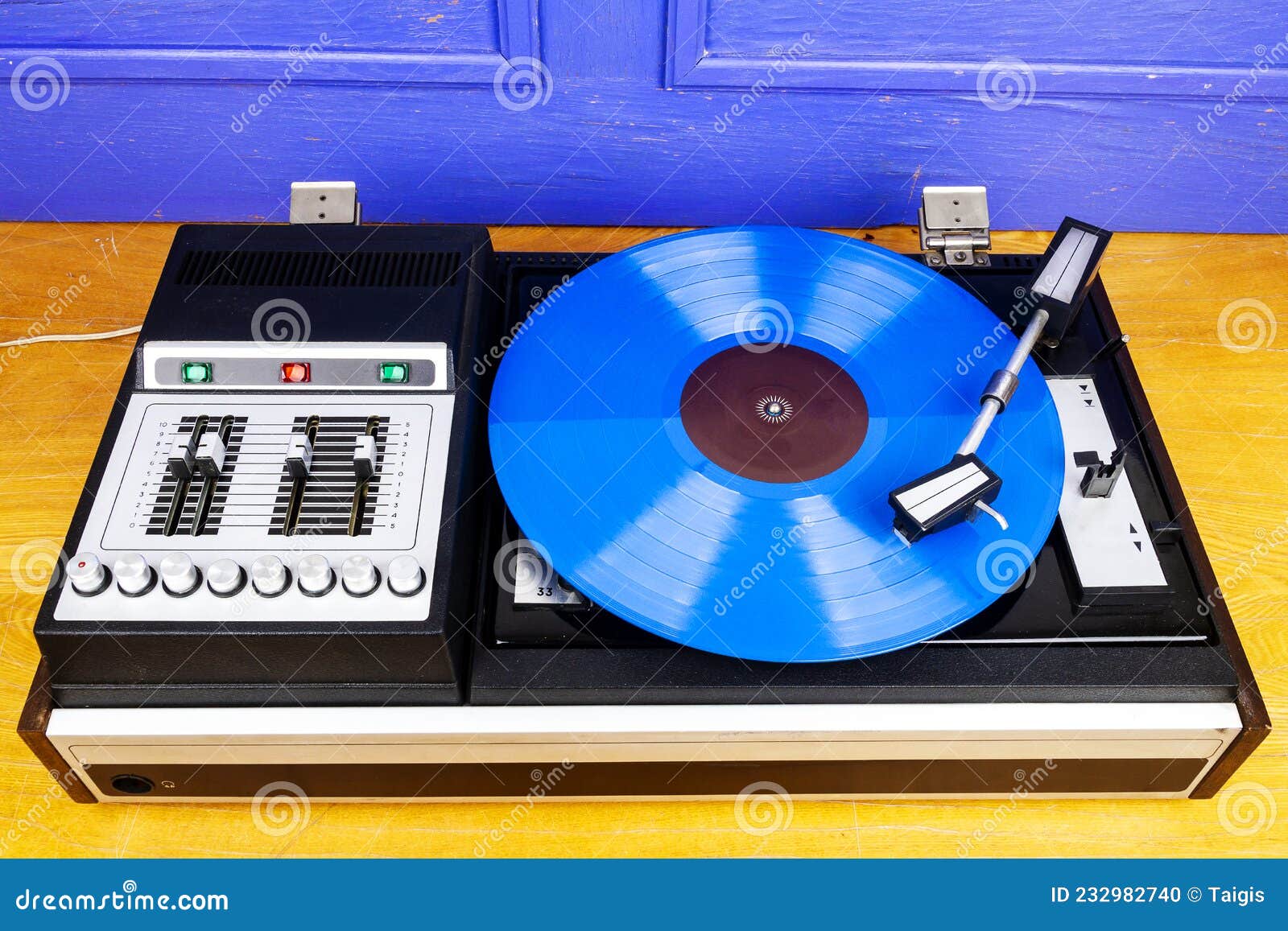 Vintage Turntable Vinyl Record Player with Blue Vinyl Stock Photo ...