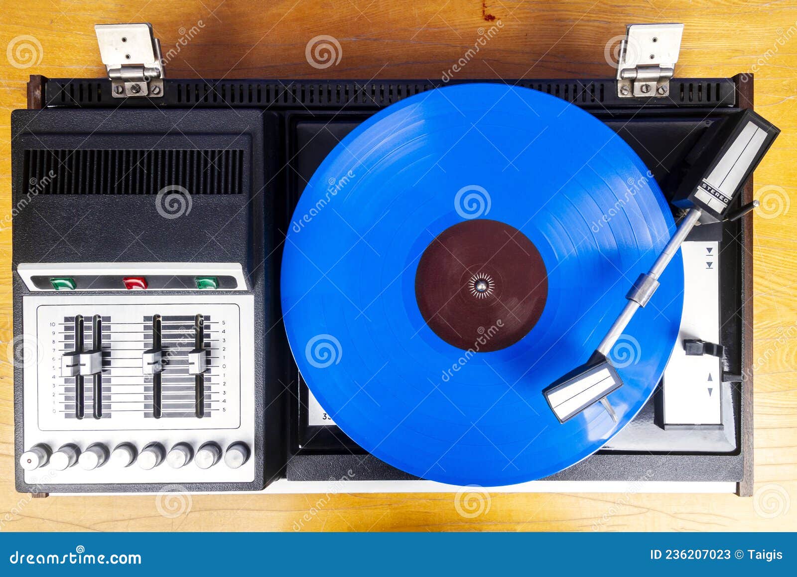 Vintage Turntable Vinyl Record Player with Blue Vinyl Stock Image ...