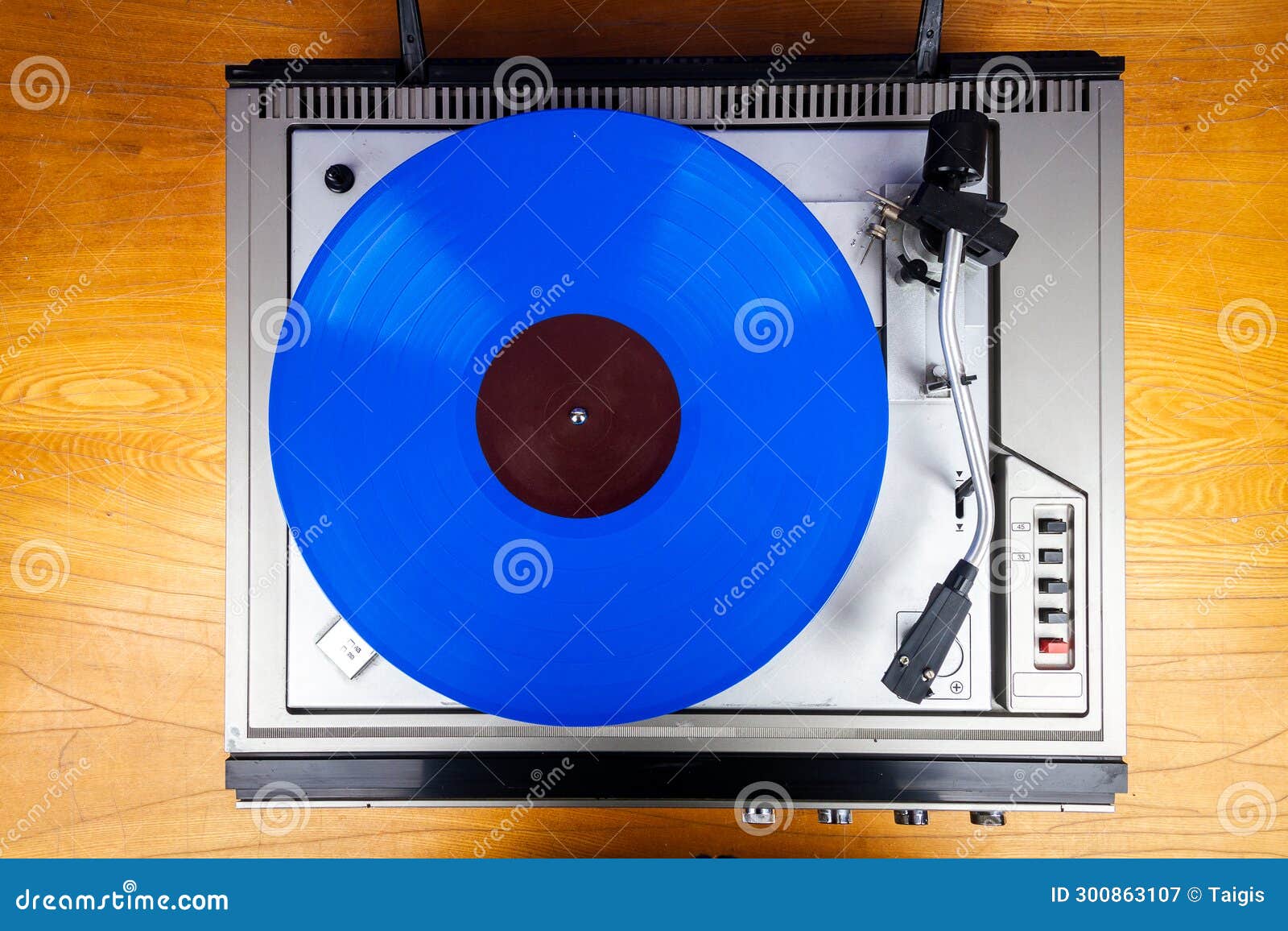Vintage Turntable Vinyl Record Player with Blue Vinyl Stock Image ...