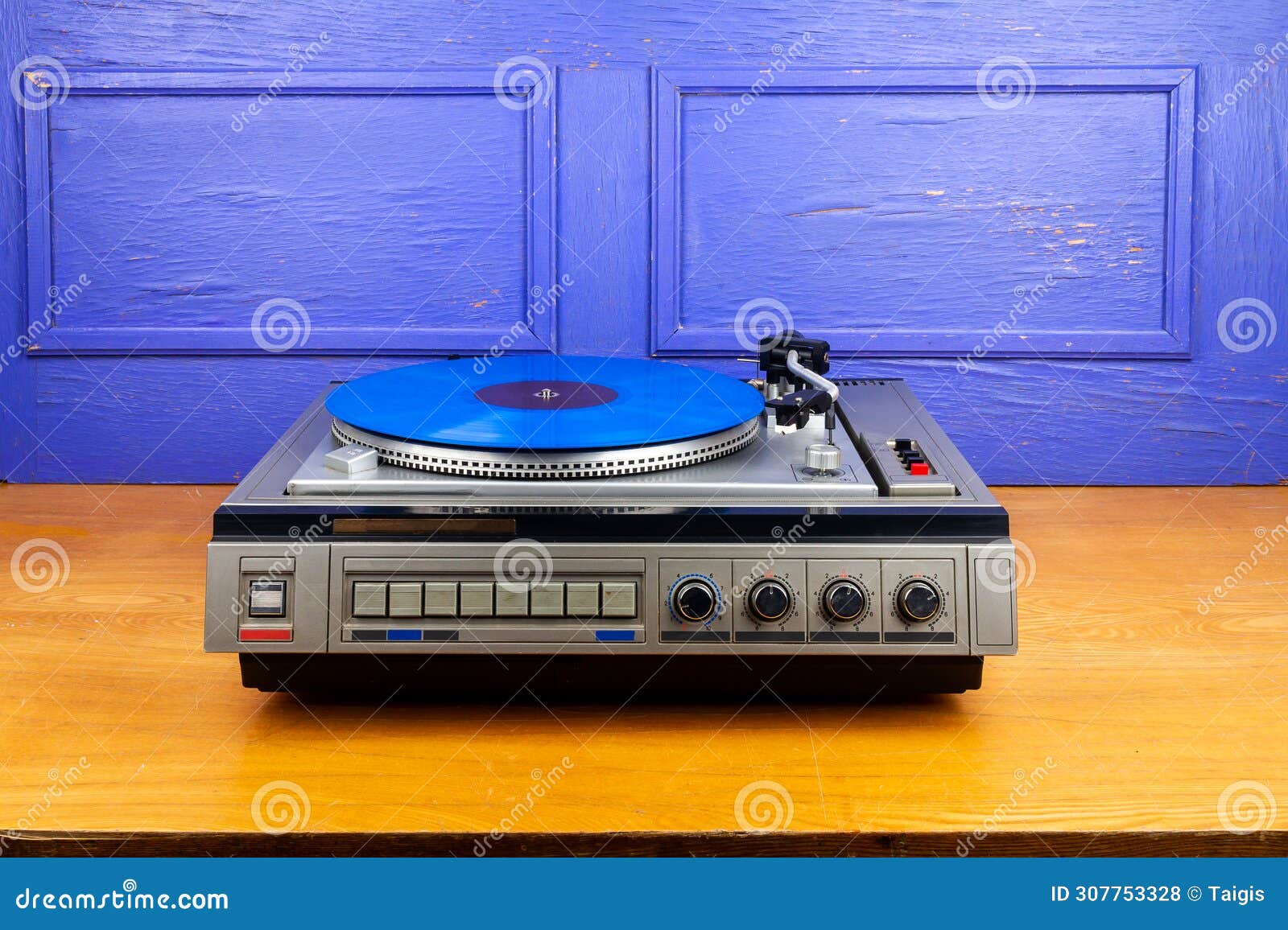 Vintage Turntable Vinyl Record Player with Blue Vinyl Stock Photo ...