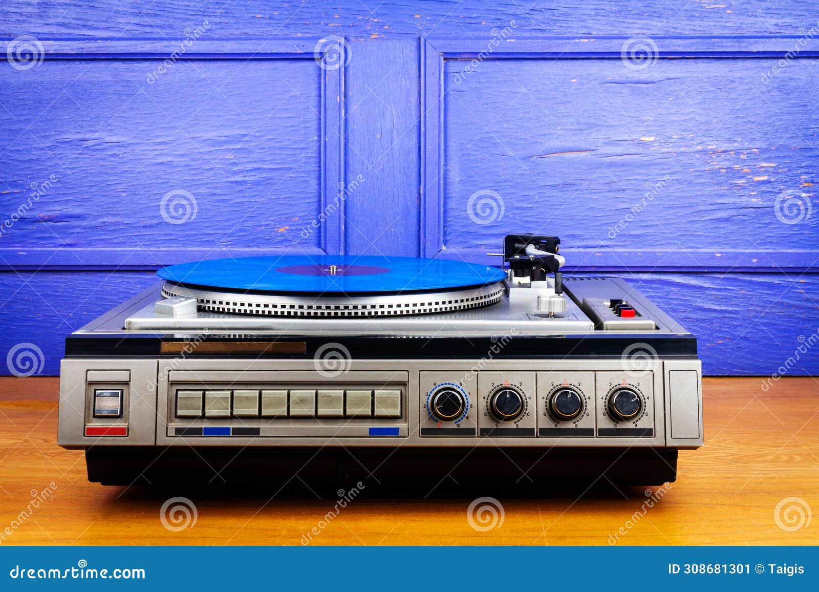 Vintage Turntable Vinyl Record Player with Blue Vinyl Stock Image ...