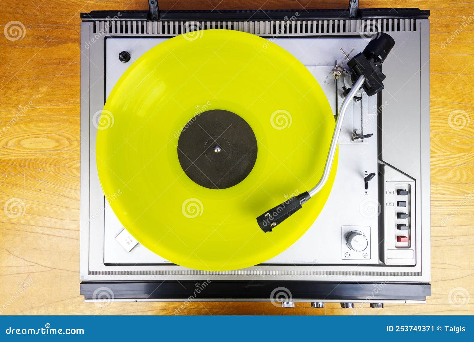Vintage Turntable Vinyl Record Player with Yellow Vinyl Stock Image ...