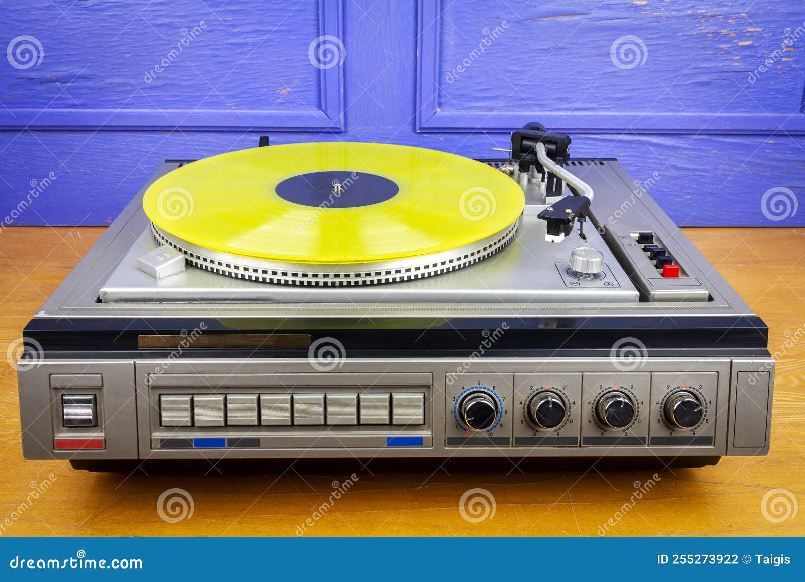 Vintage Turntable Vinyl Record Player with Yellow Vinyl Stock Photo ...