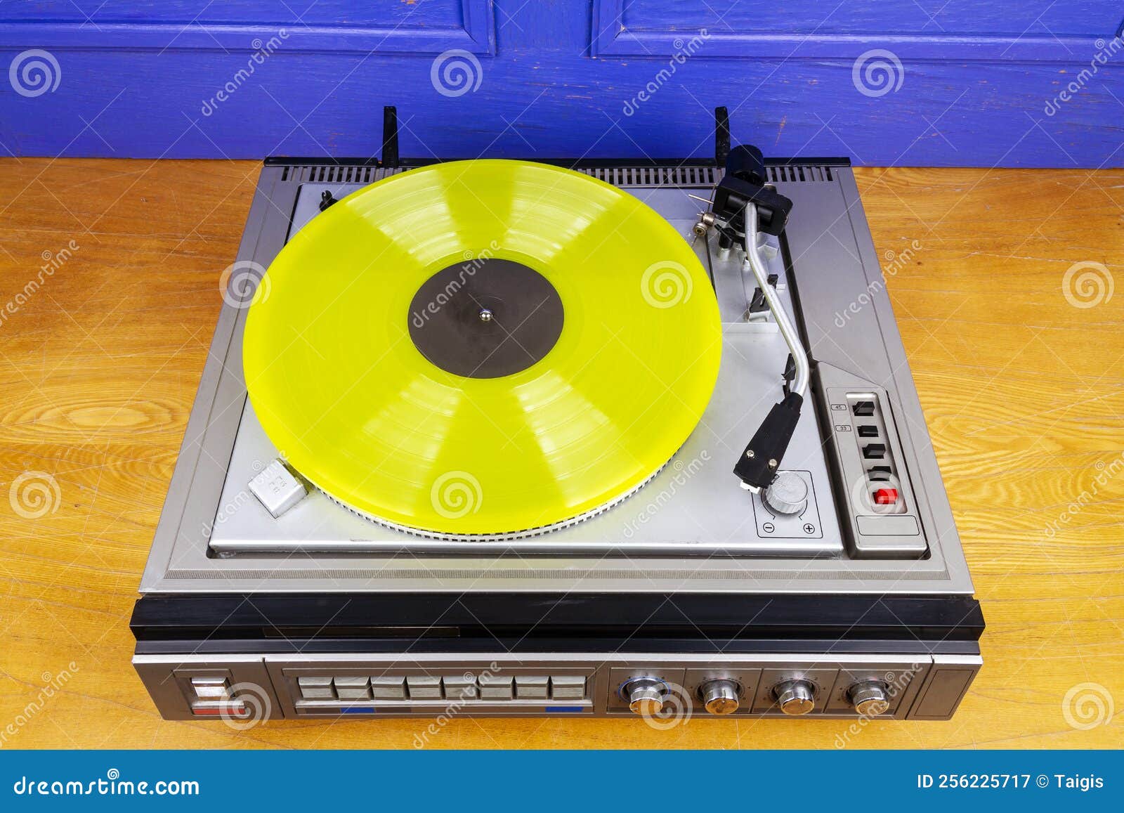 Vintage Turntable Vinyl Record Player with Yellow Vinyl Stock Image ...
