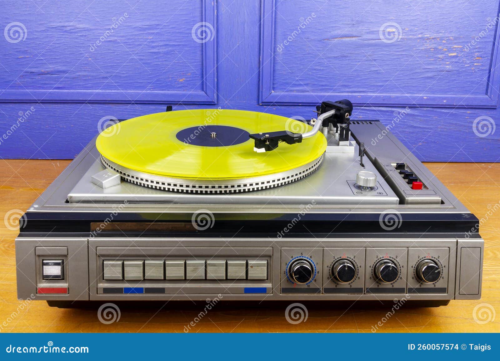 Vintage Turntable Vinyl Record Player with Yellow Vinyl Stock Photo ...