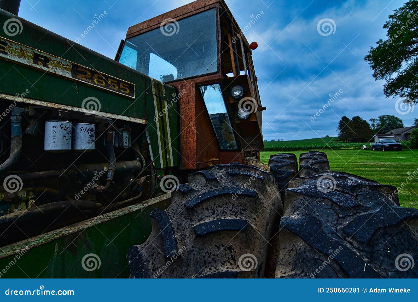 Vintage Weathered and Rusty Oliver Tractor with Oversize Worn Tires in ...