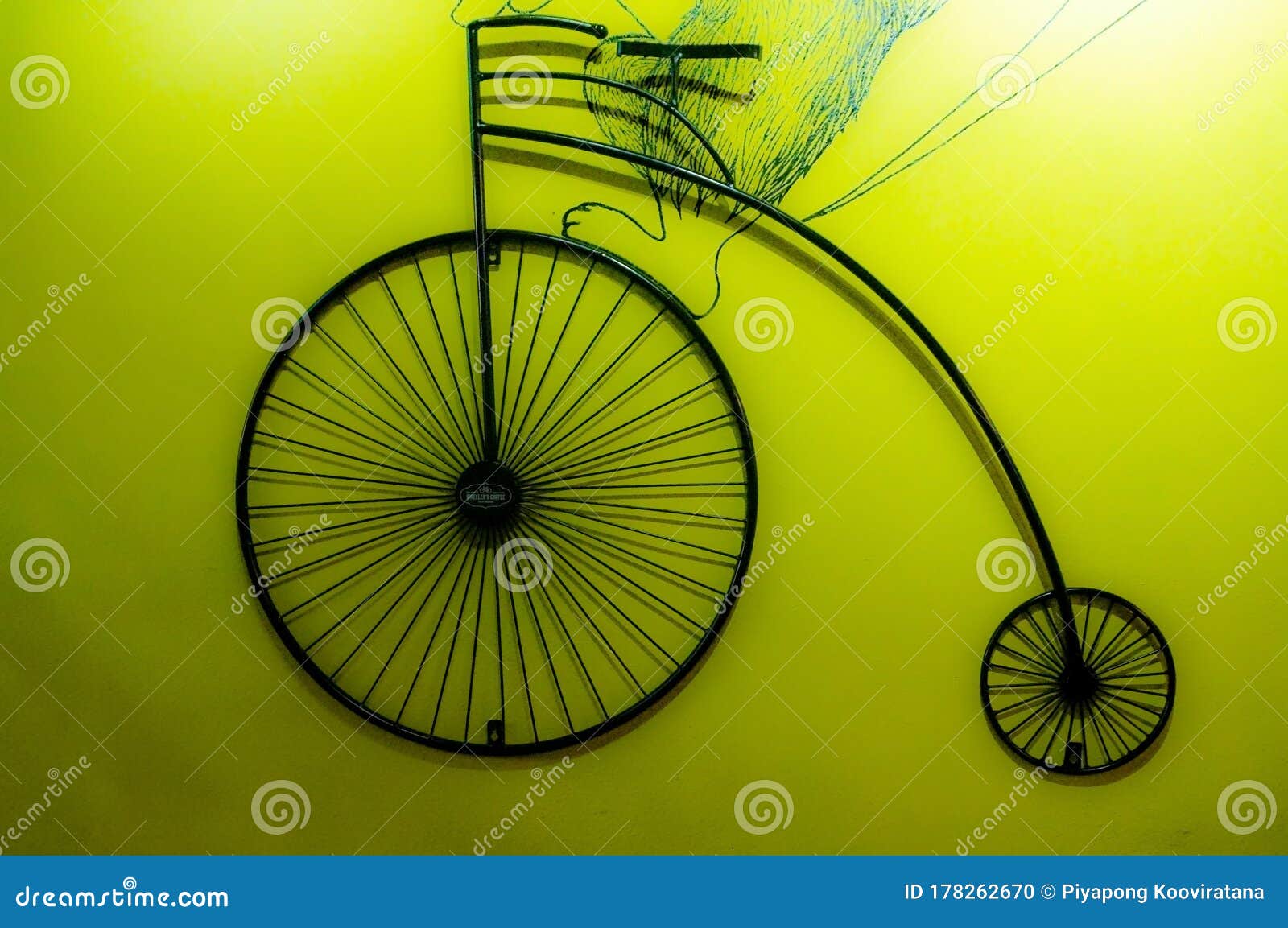 Vintage Wheel Of Bicycle With Yellow Background Stock Photo ...