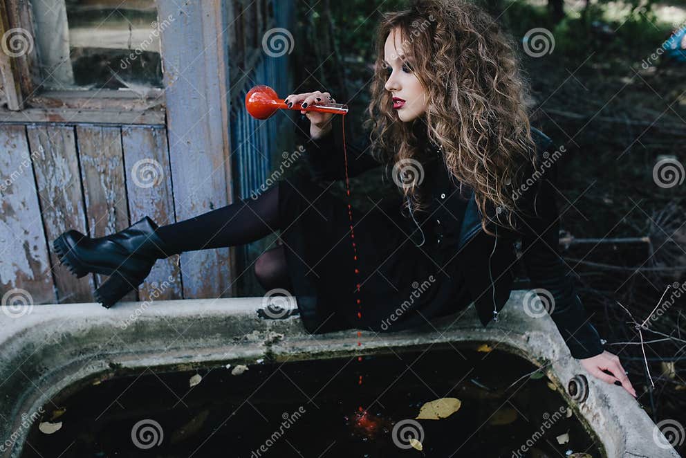 Vintage Witch with Elixir in Hand Stock Image - Image of bottle ...