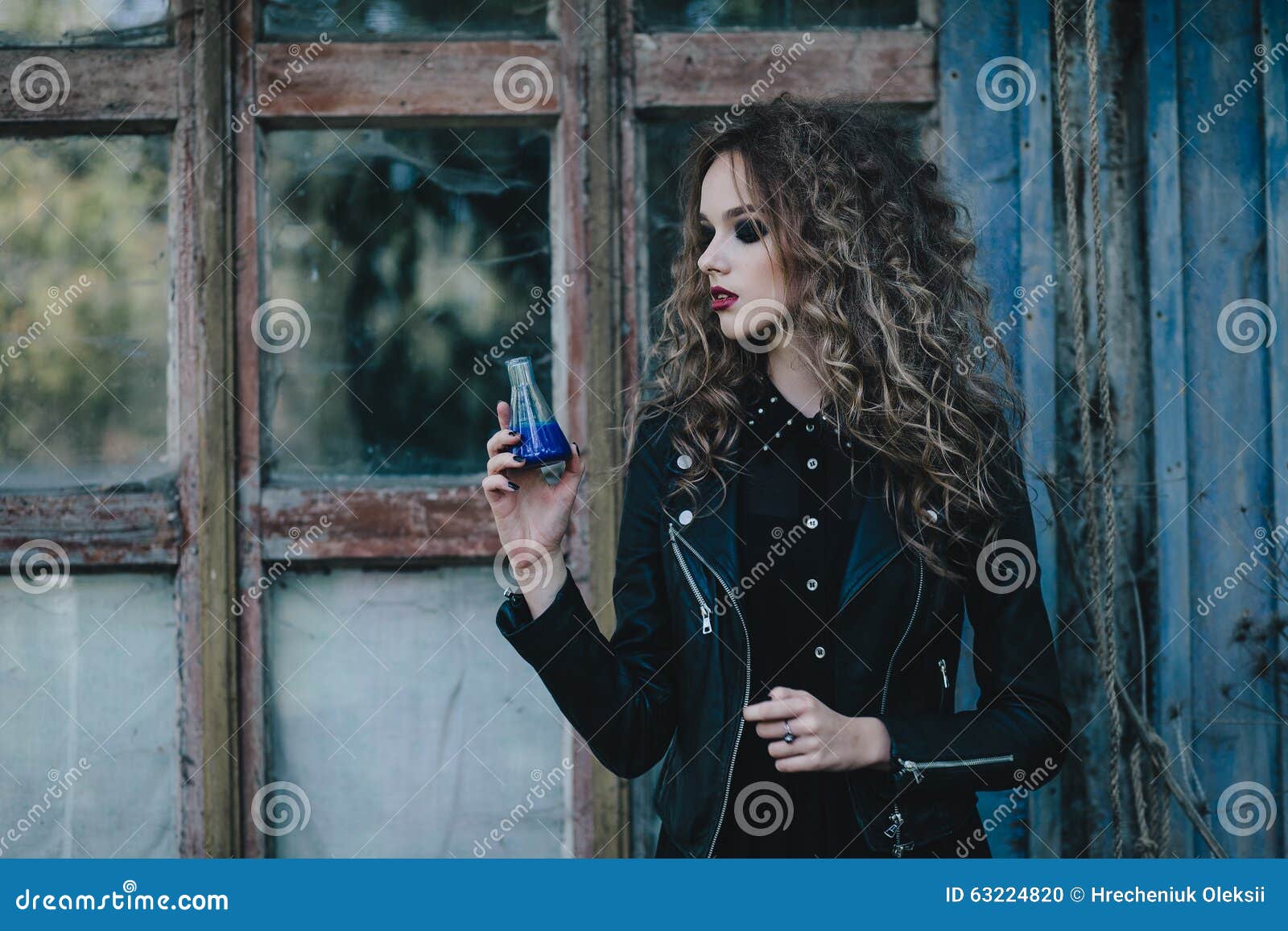 Vintage Witch with Elixir in Hand Stock Photo - Image of bottle, girl ...