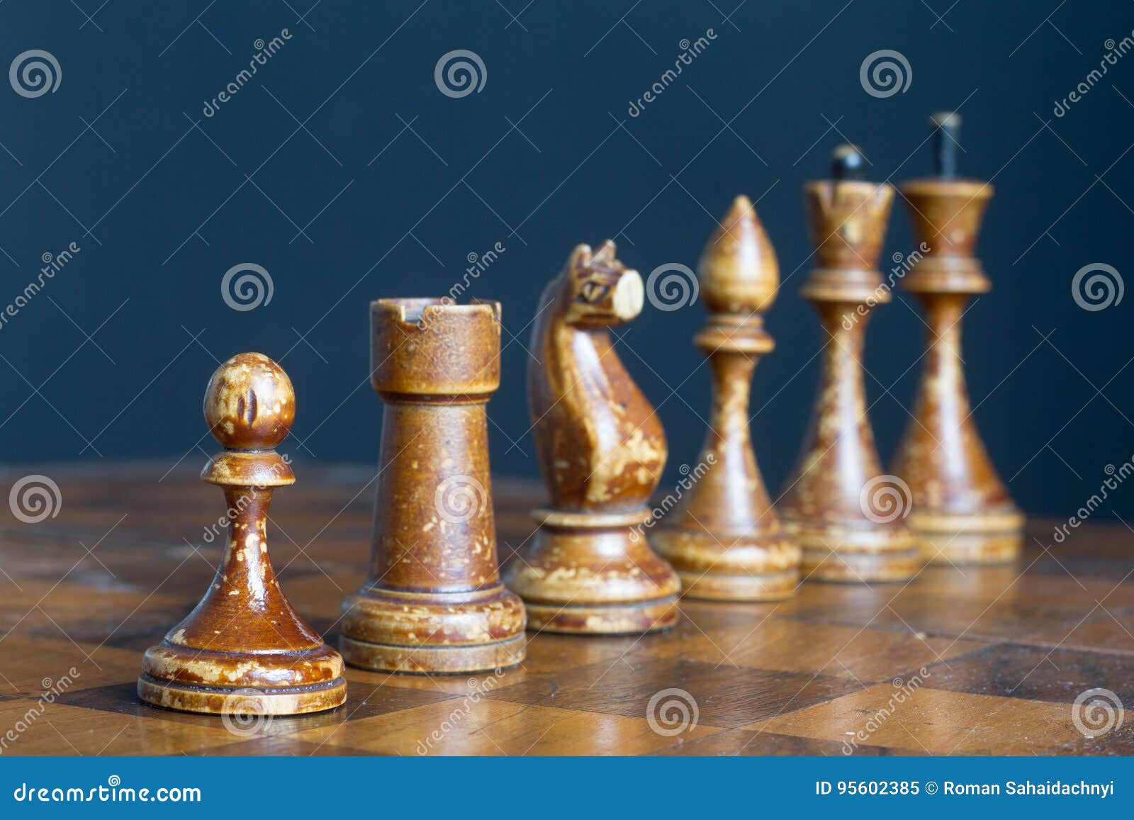 Vintage Wooden Chess Pieces on an Old Chessboard. Stock Image - Image ...