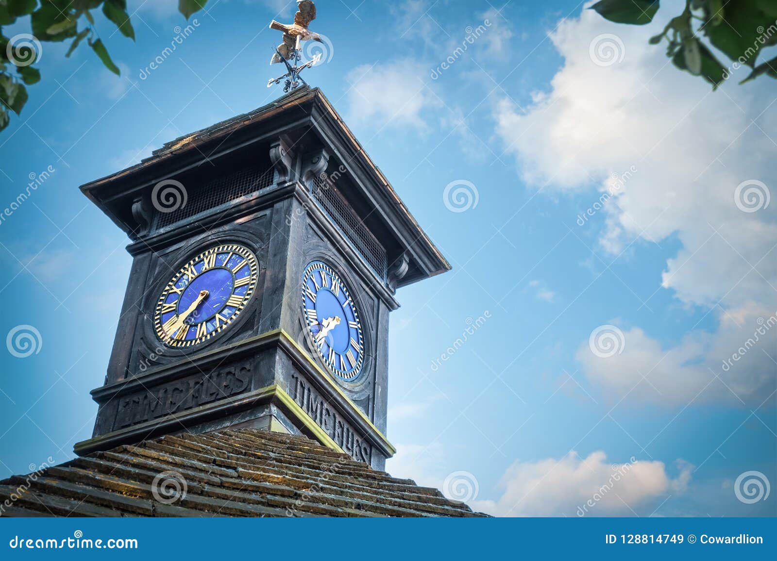 A Vintage Wooden Clock Tower Stock Image - Image of flies, outdoor ...