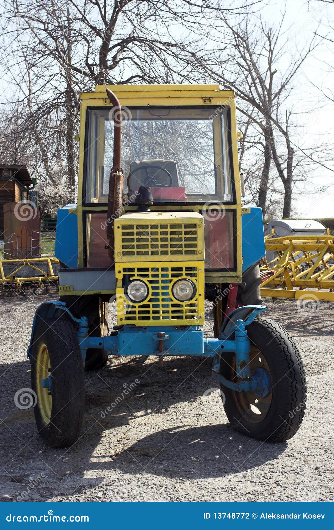 Vintage yellow tractor stock photo. Image of transportation - 13748772
