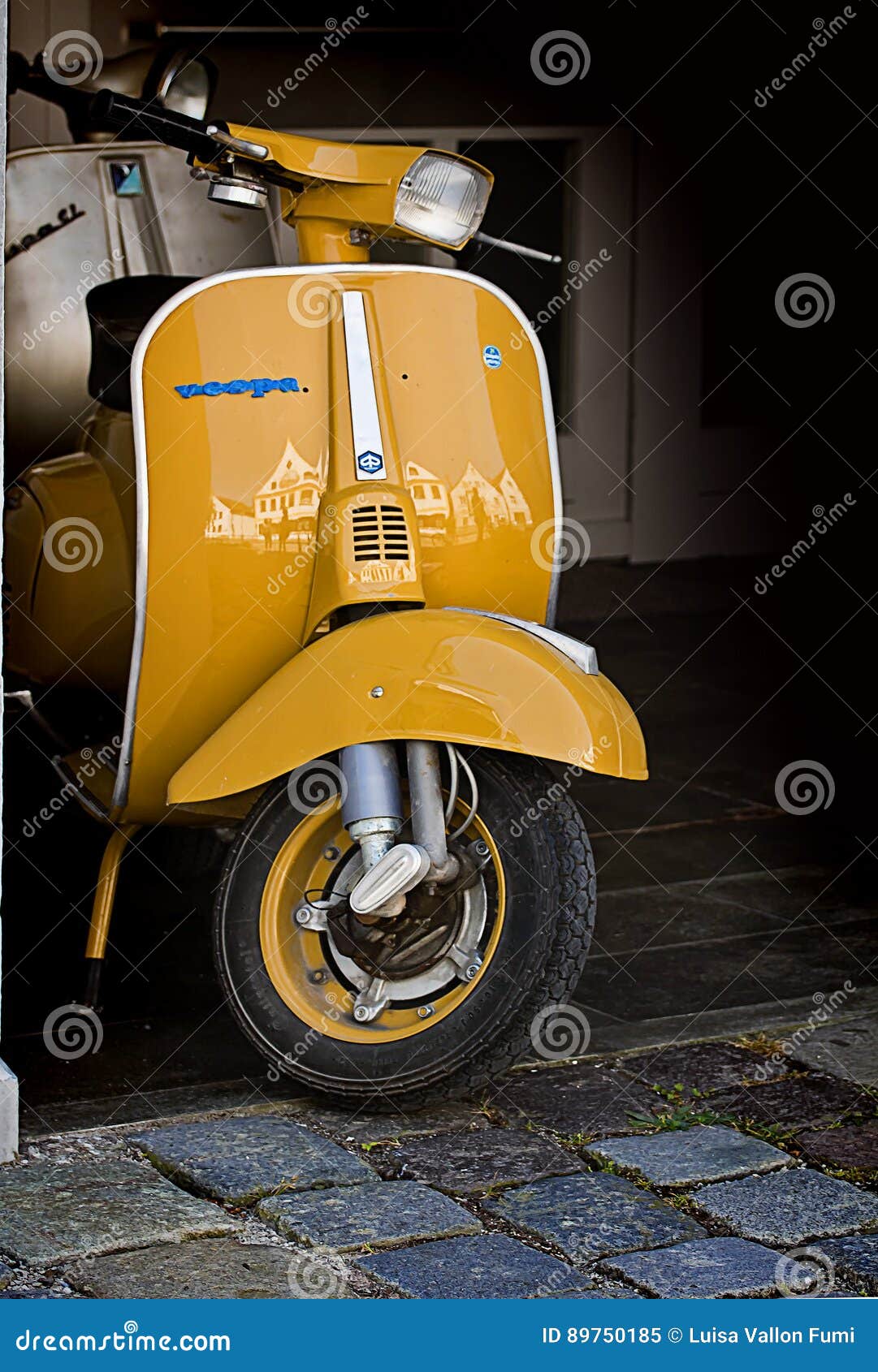 Vintage yellow Vespa editorial image. Image of urban - 89750185
