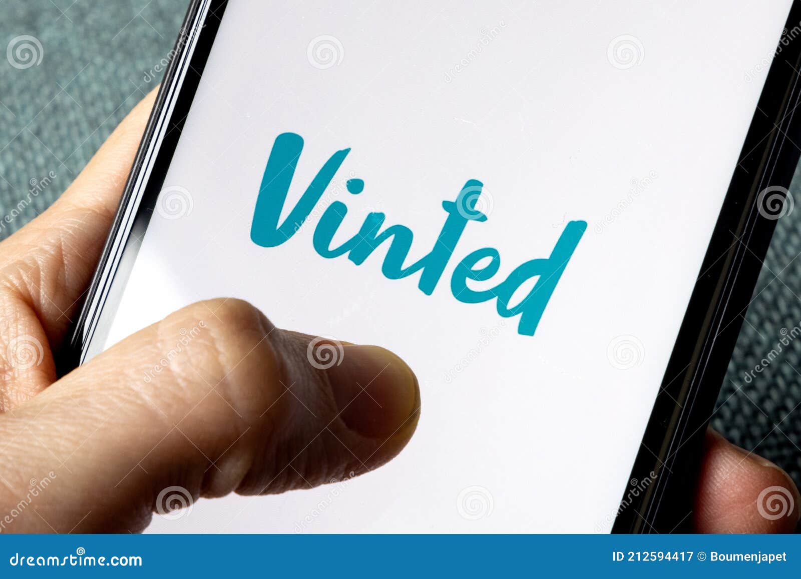 Vinted Iphone Screen with Vinted Logo Displayed with Hand. Editorial ...