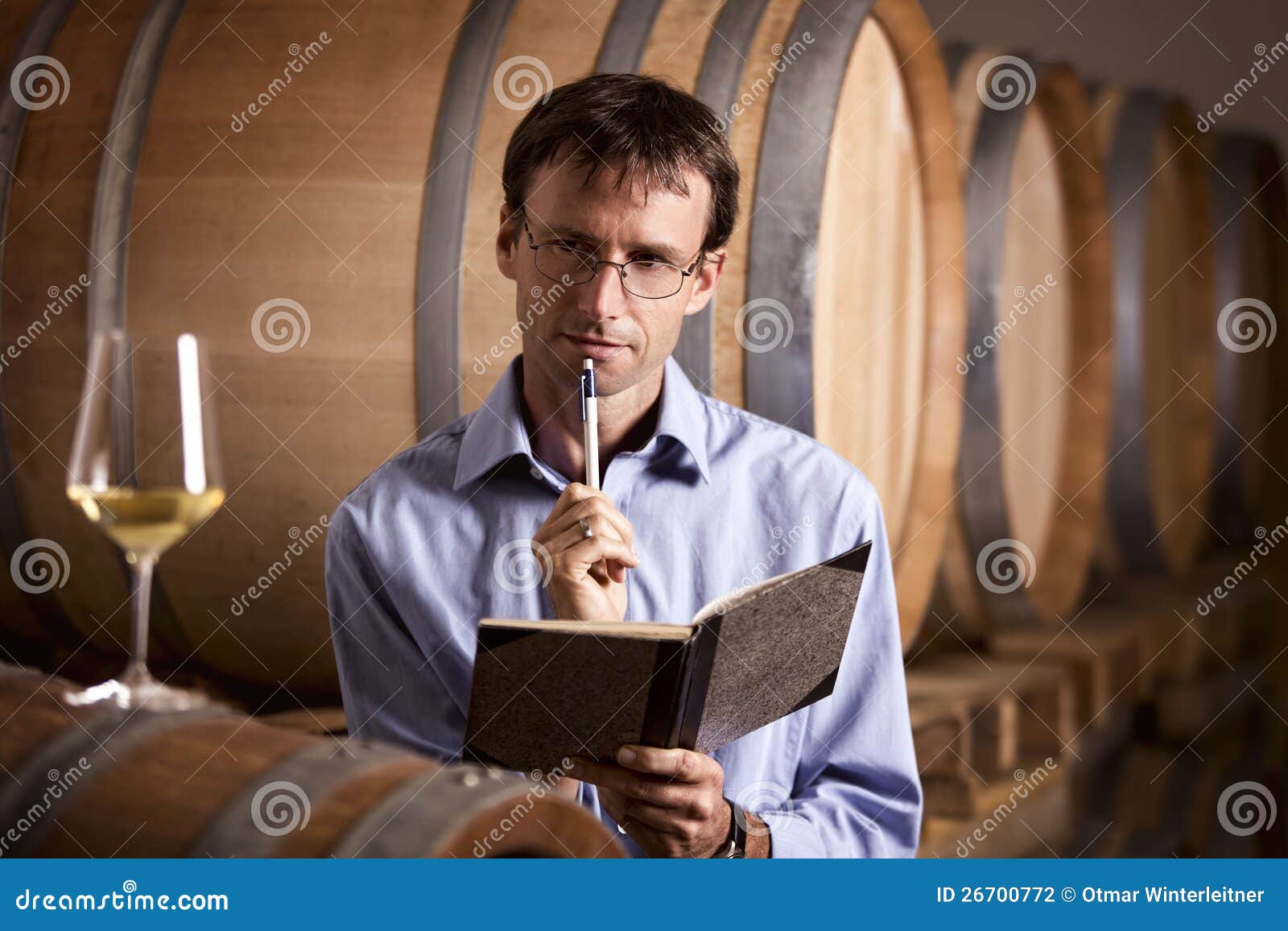 Vintner in Cellar Analyzing White Wine. Stock Photo - Image of person ...