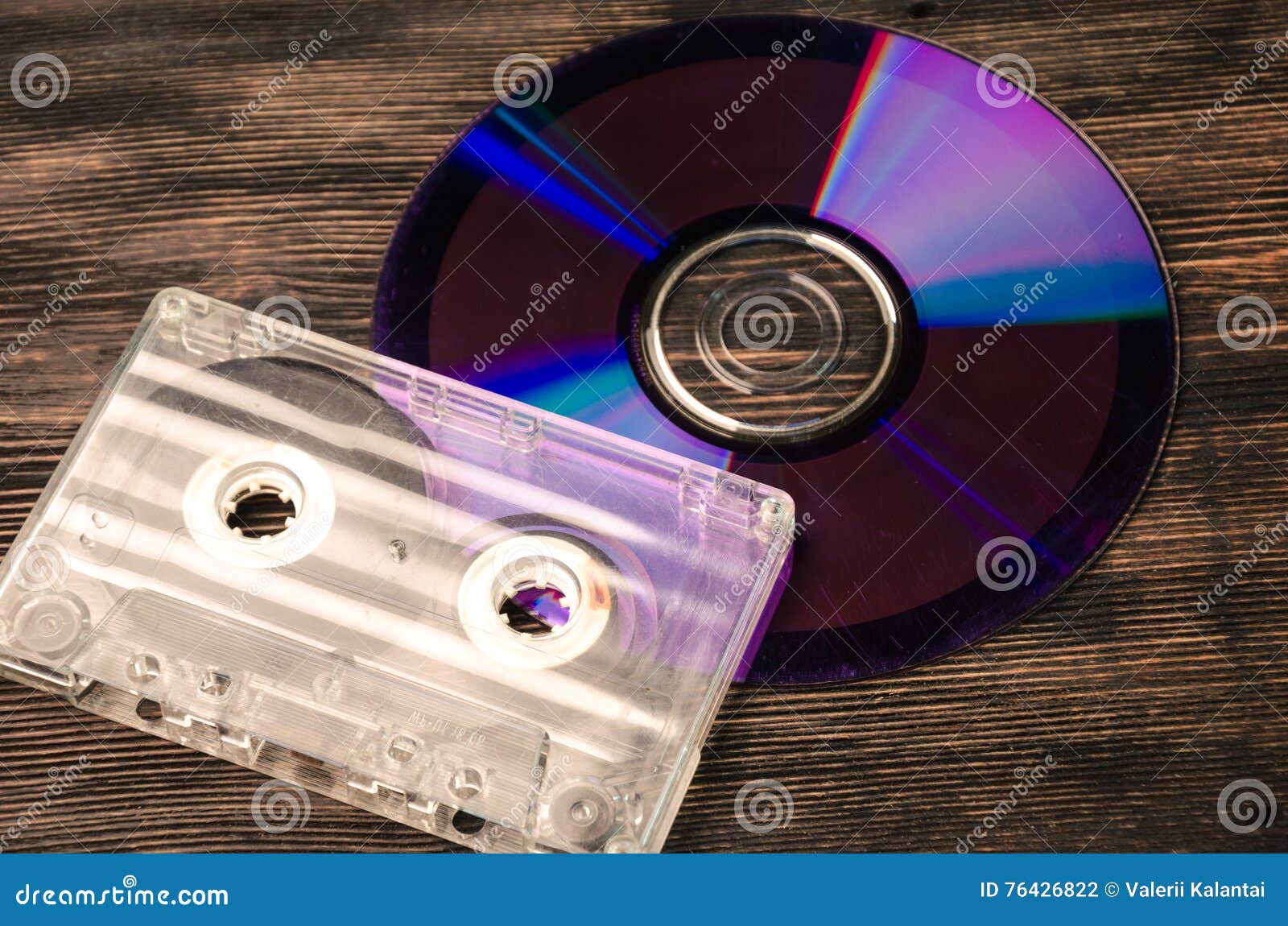 Vinyl Disc and Cassette Tapes on the Wooden Table. Stock Photo - Image ...