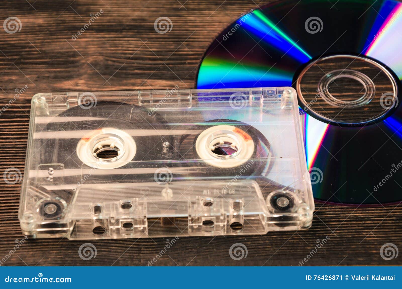 Vinyl Disc and Cassette Tapes on the Wooden Table. Stock Image - Image ...