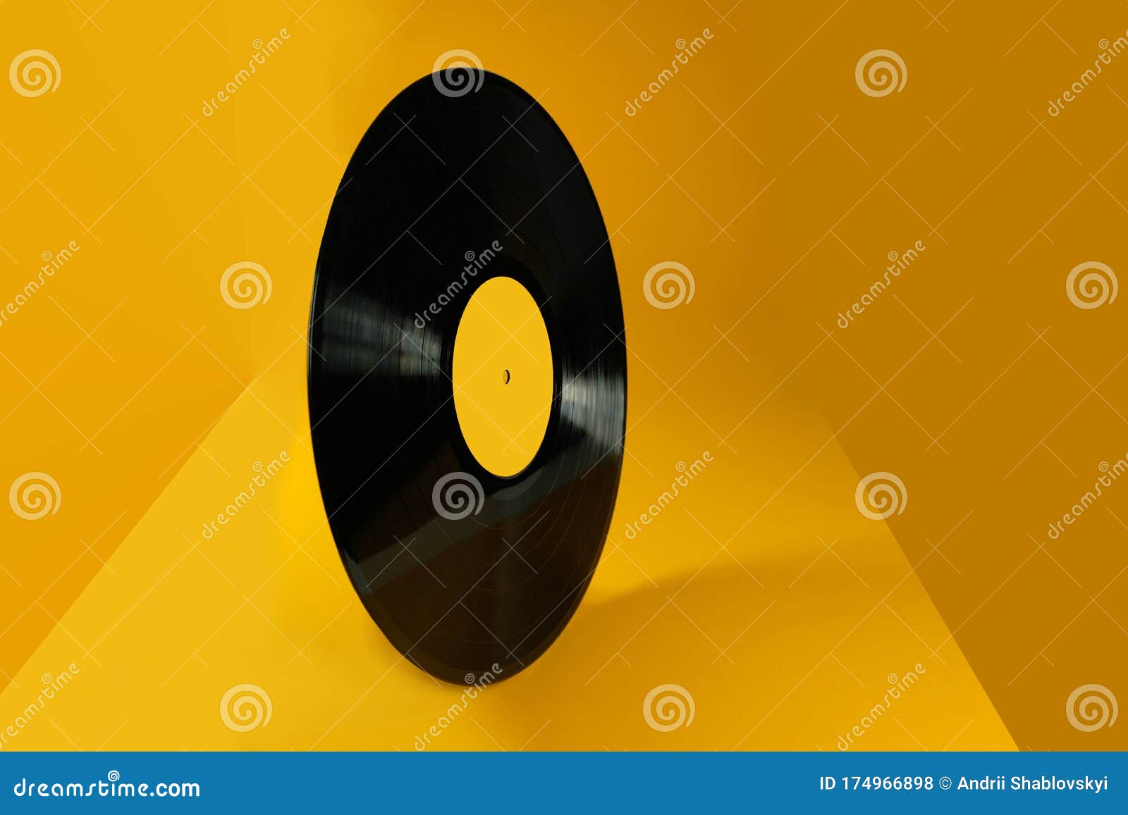 Vinyl Record on an Abstract Yellow Background. Old Vintage Vinyl Record ...