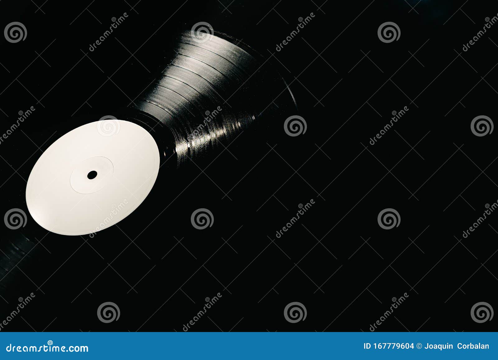 Vinyl Record on Black Background Illuminated, Copy Space Stock Photo ...