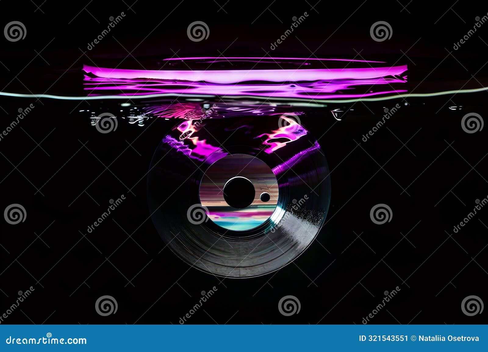 Vinyl Record on a Black Background Reflects Vibrant, Colorful Light ...