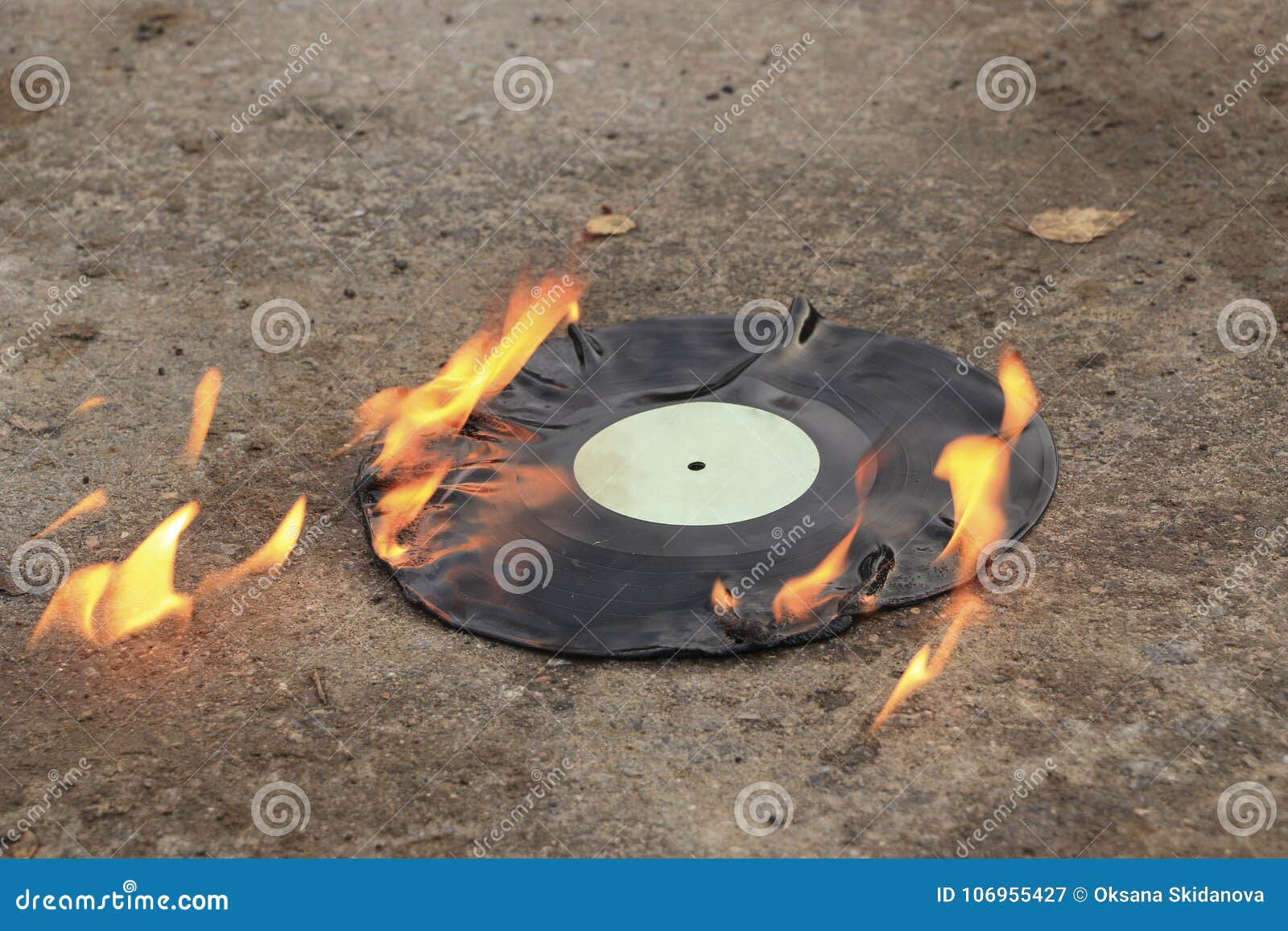 Vinyl Record Burns Bright Orange Flame on the Asphalt Stock Image ...