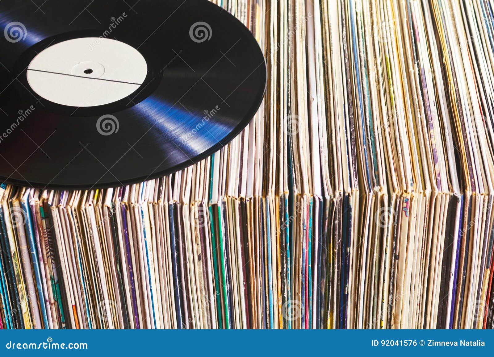 Vinyl Record on a Collection of Albums Stock Photo - Image of pile ...