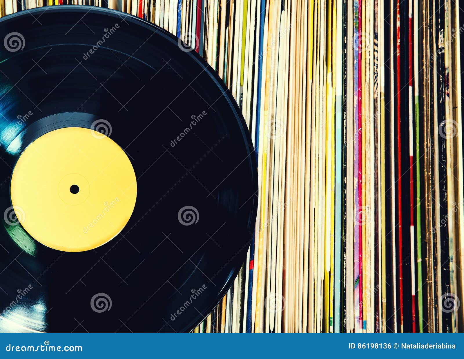 Vinyl Record and a Collection of Albums Stock Photo - Image of closeup ...