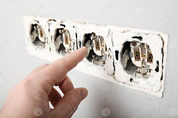 Violation of Electrical Safety Rules, Damaged Socket in the Wall Stock ...
