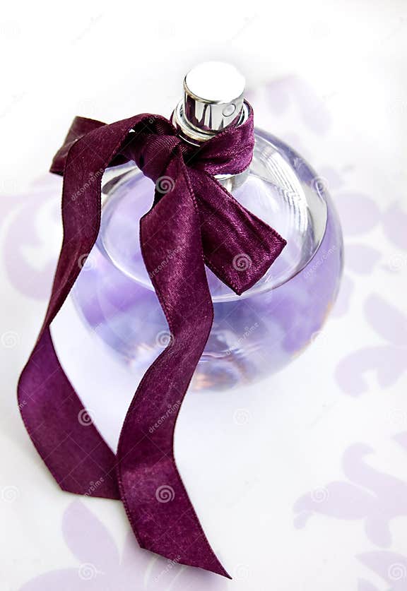 Violet bottle of perfum stock photo. Image of freshness - 16887766