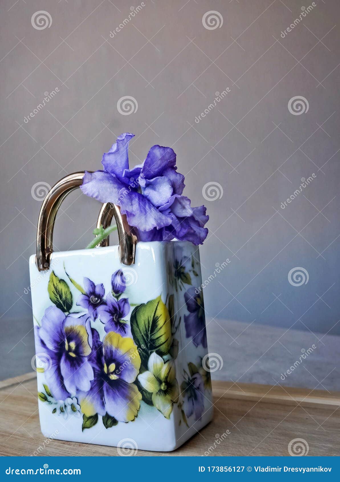 Violet flower in a vase stock image. Image of shape - 173856127