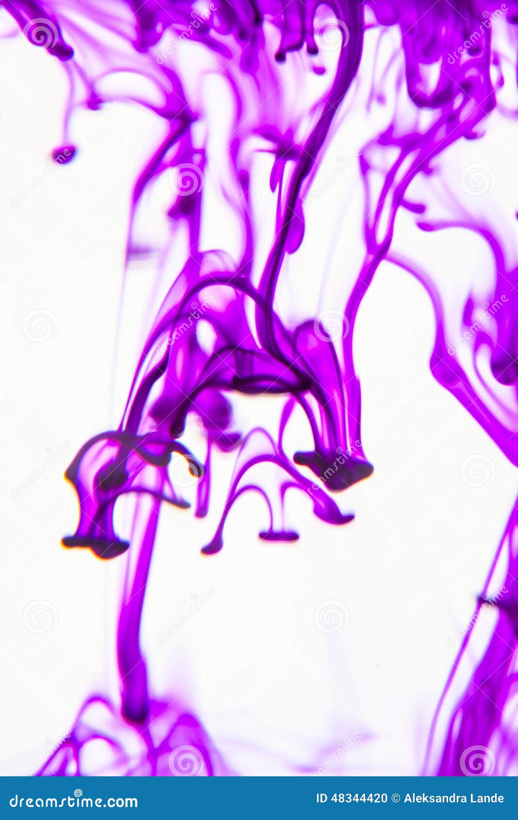 Violet liquid in water stock photo. Image of drop, motion - 48344420