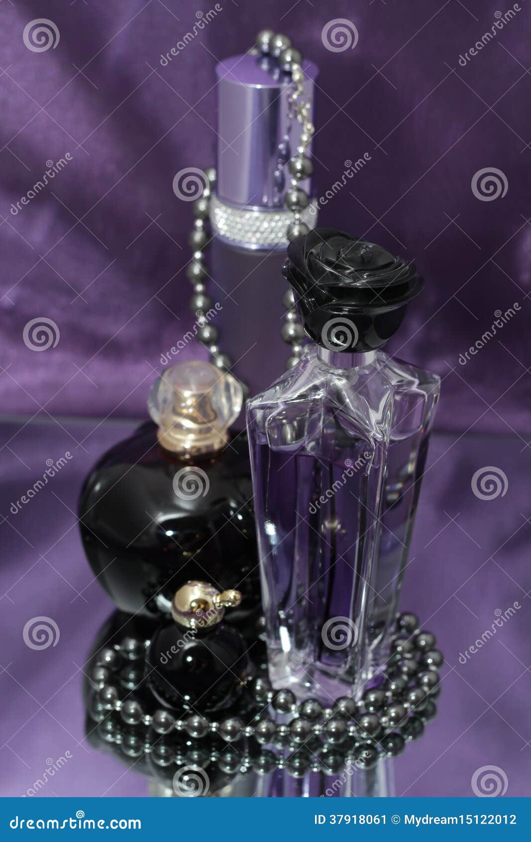 Violet perfume bottles stock image. Image of feminine - 37918061