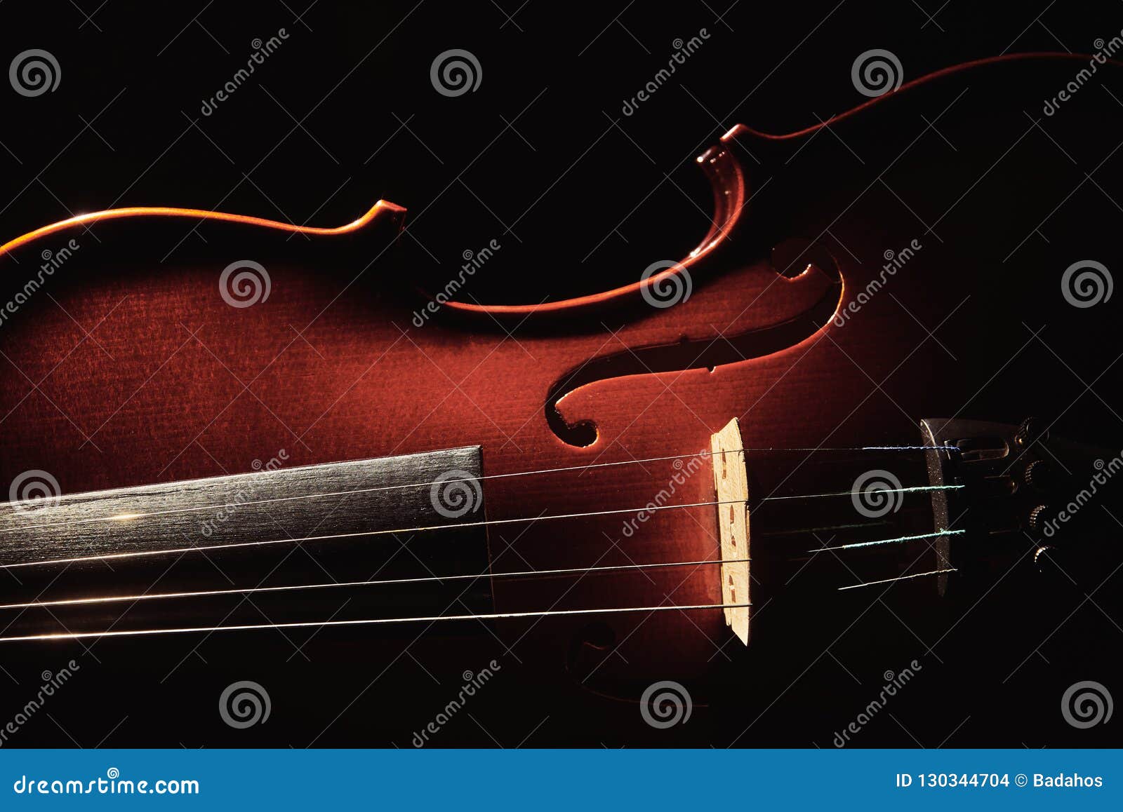 Violin on black background stock photo. Image of fiddlestick - 130344704