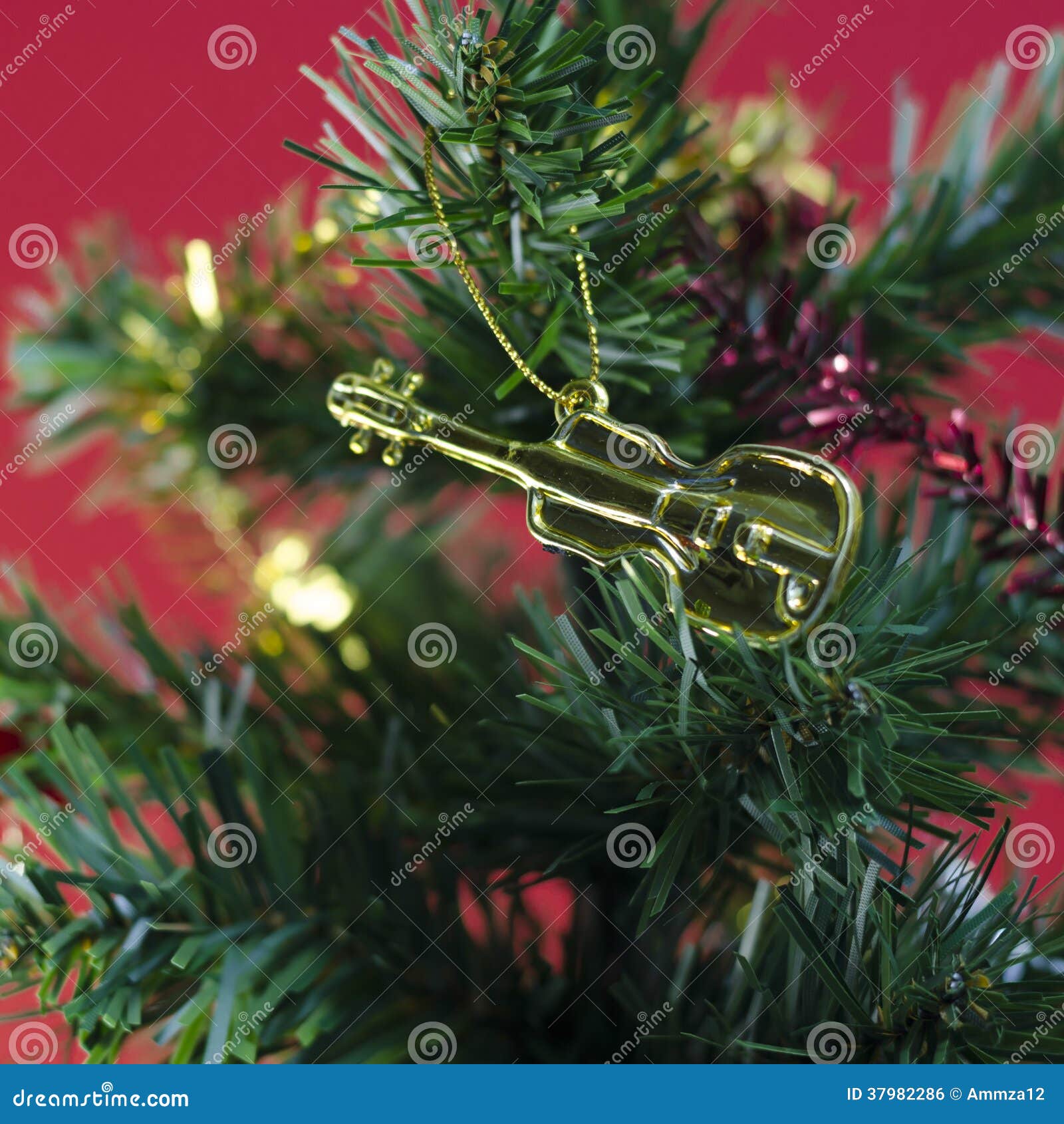 Violin on christmas tree stock photo. Image of presents - 37982286