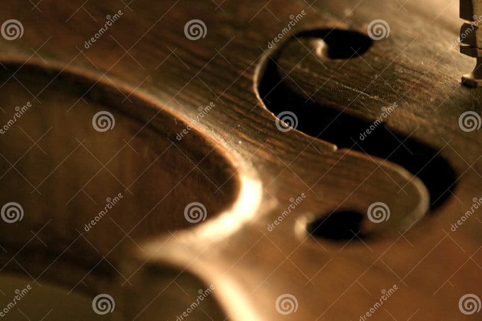 Violin f scroll detail stock image. Image of masterpiece - 841999