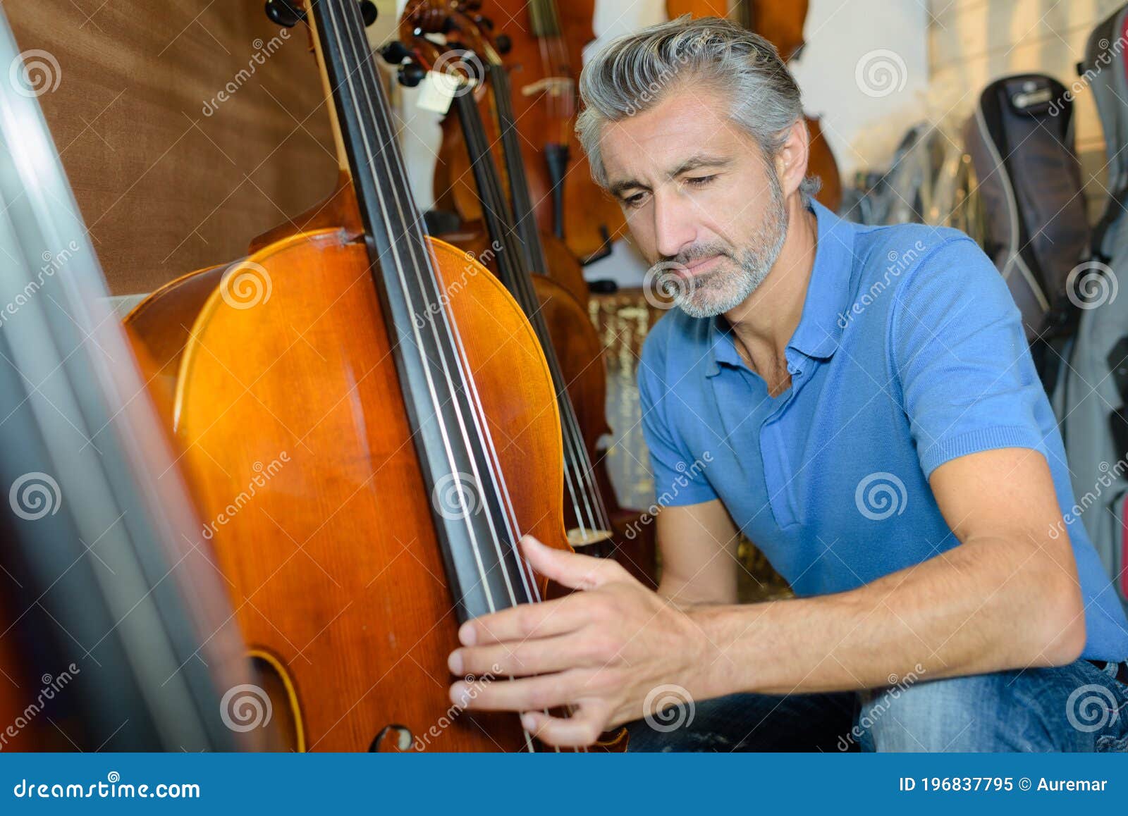 Violin Maker while Testing Violins in Workshop Stock Image - Image of ...