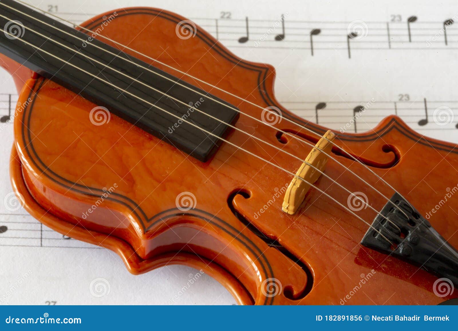 Violin on note paper stock photo. Image of background - 182891856