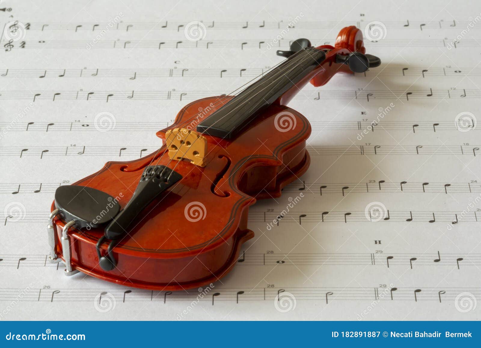 Violin on note paper stock image. Image of performance - 182891887