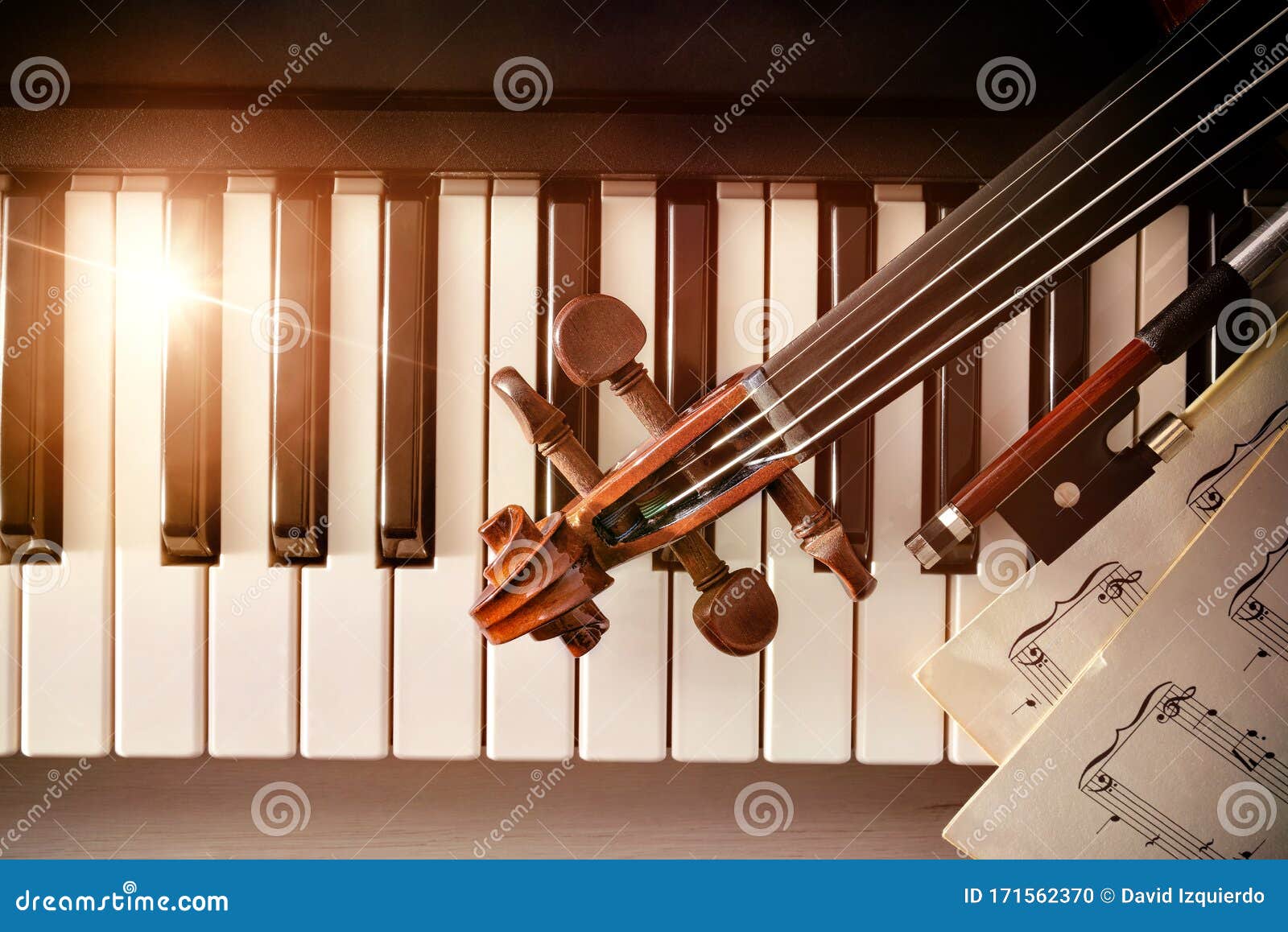 Violin Pegbox Bow and Sheet Music on Piano Keys Top Stock Photo - Image ...