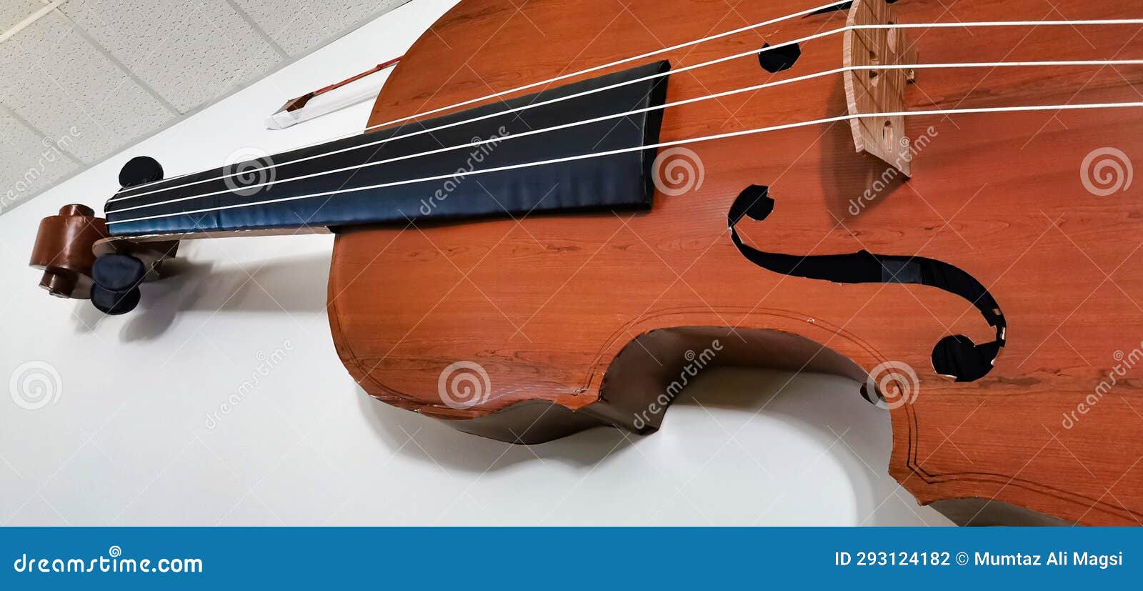 A violin on a wall stock photo. Image of viola, violin - 293124182