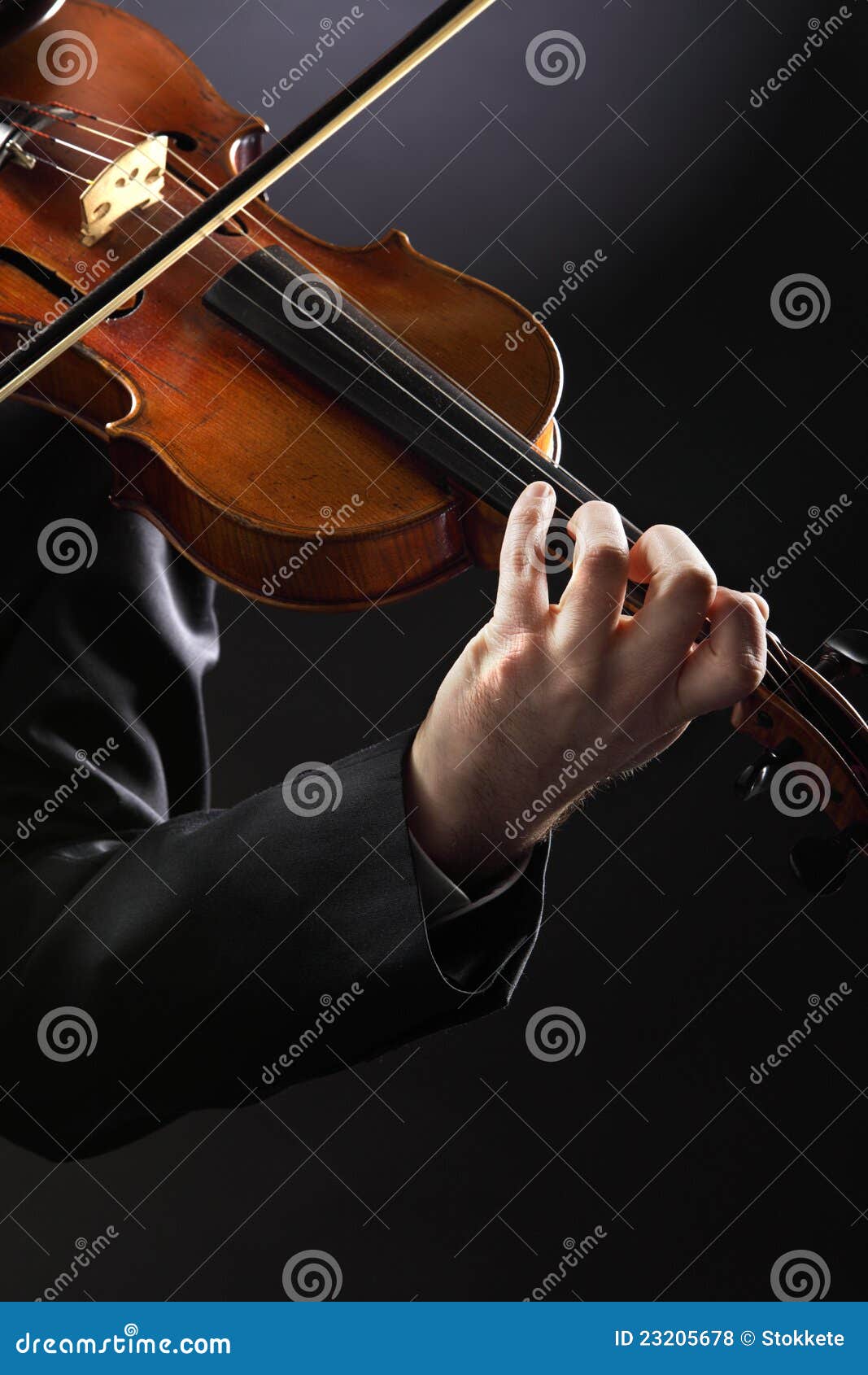 The violinist stock photo. Image of orchestra, hand, dark - 23205678