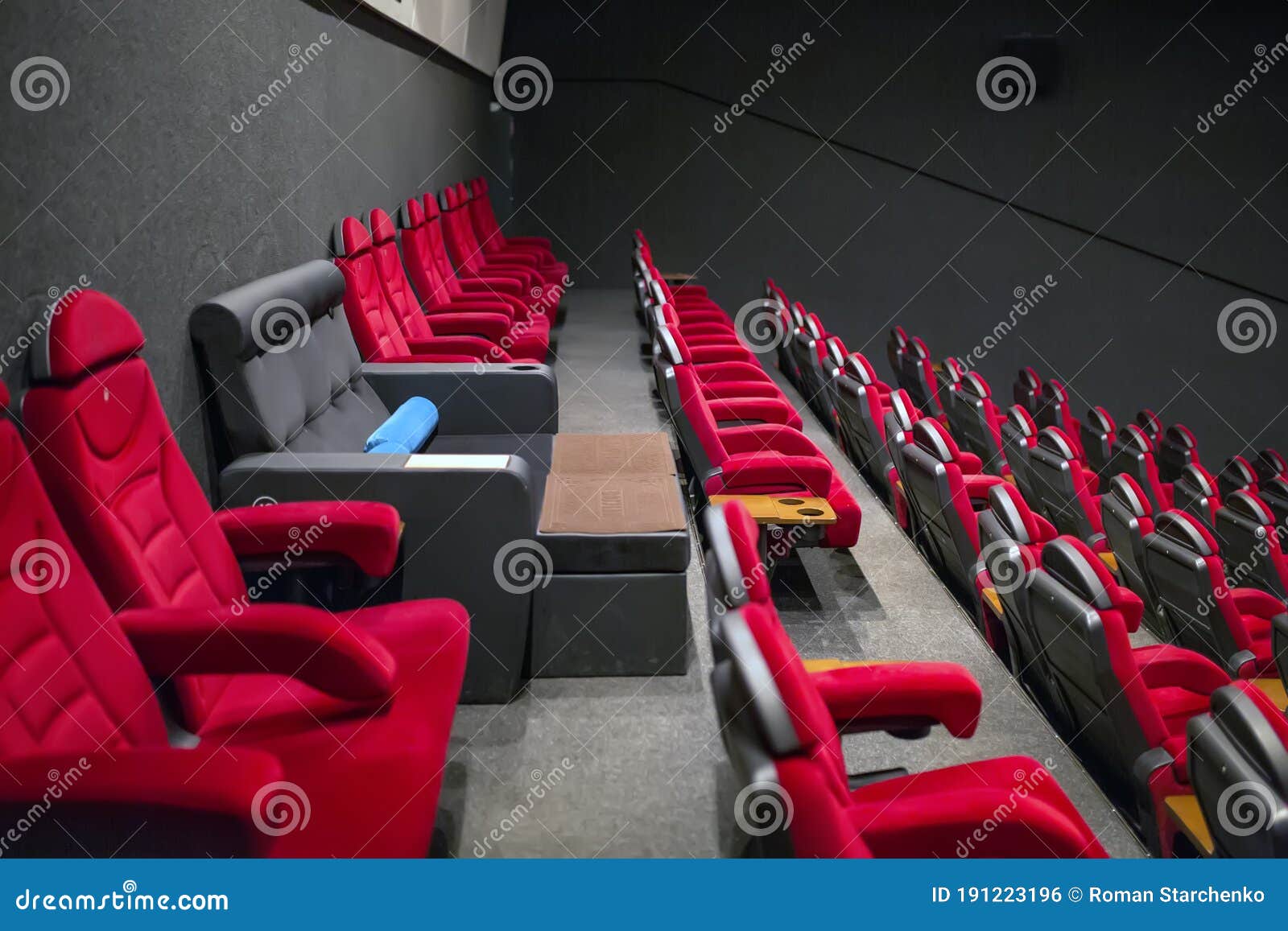 VIP Chair in an Empty Cinema among Red Chairs Stock Photo - Image of ...