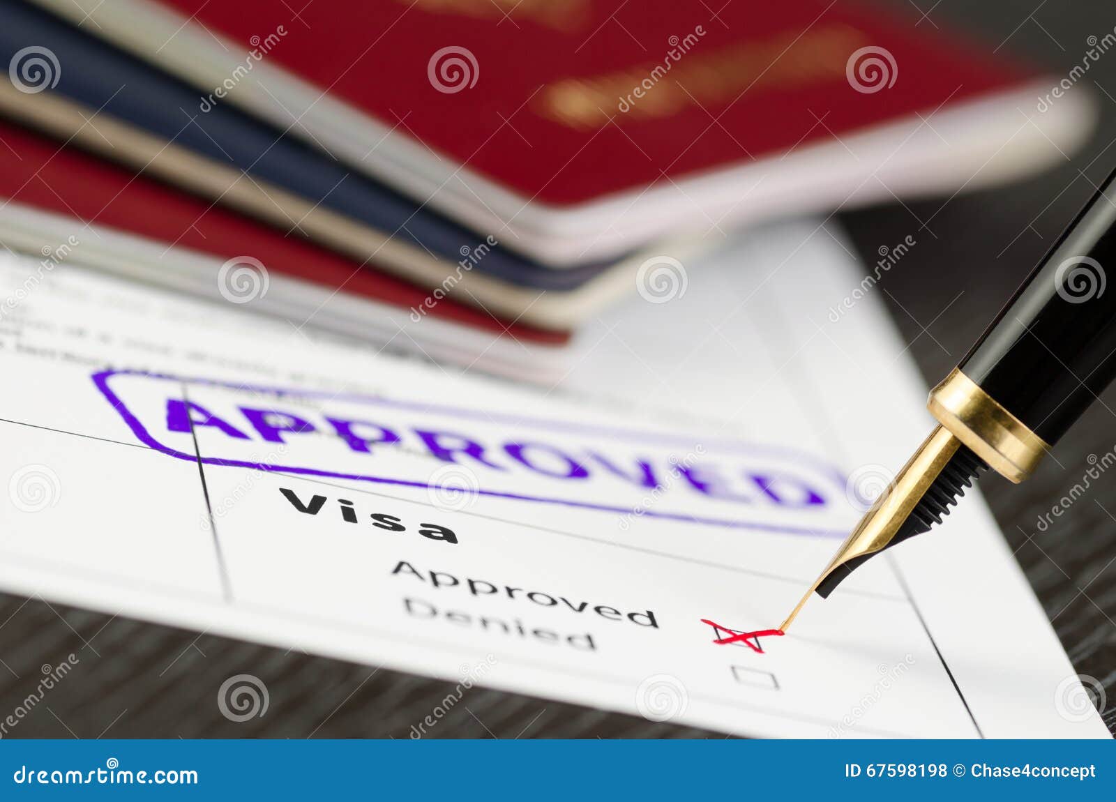 Visa Application Approved Close Up Shot Of A Form Passports And Pen