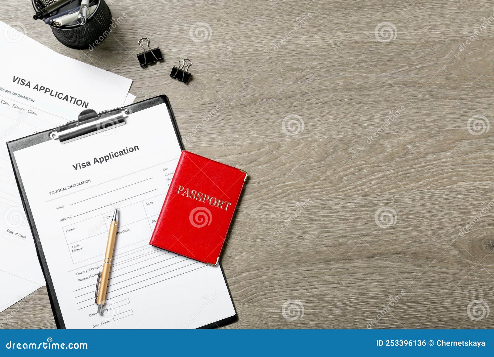 Visa Application Form, Passport and Stationery on Wooden Table, Flat ...