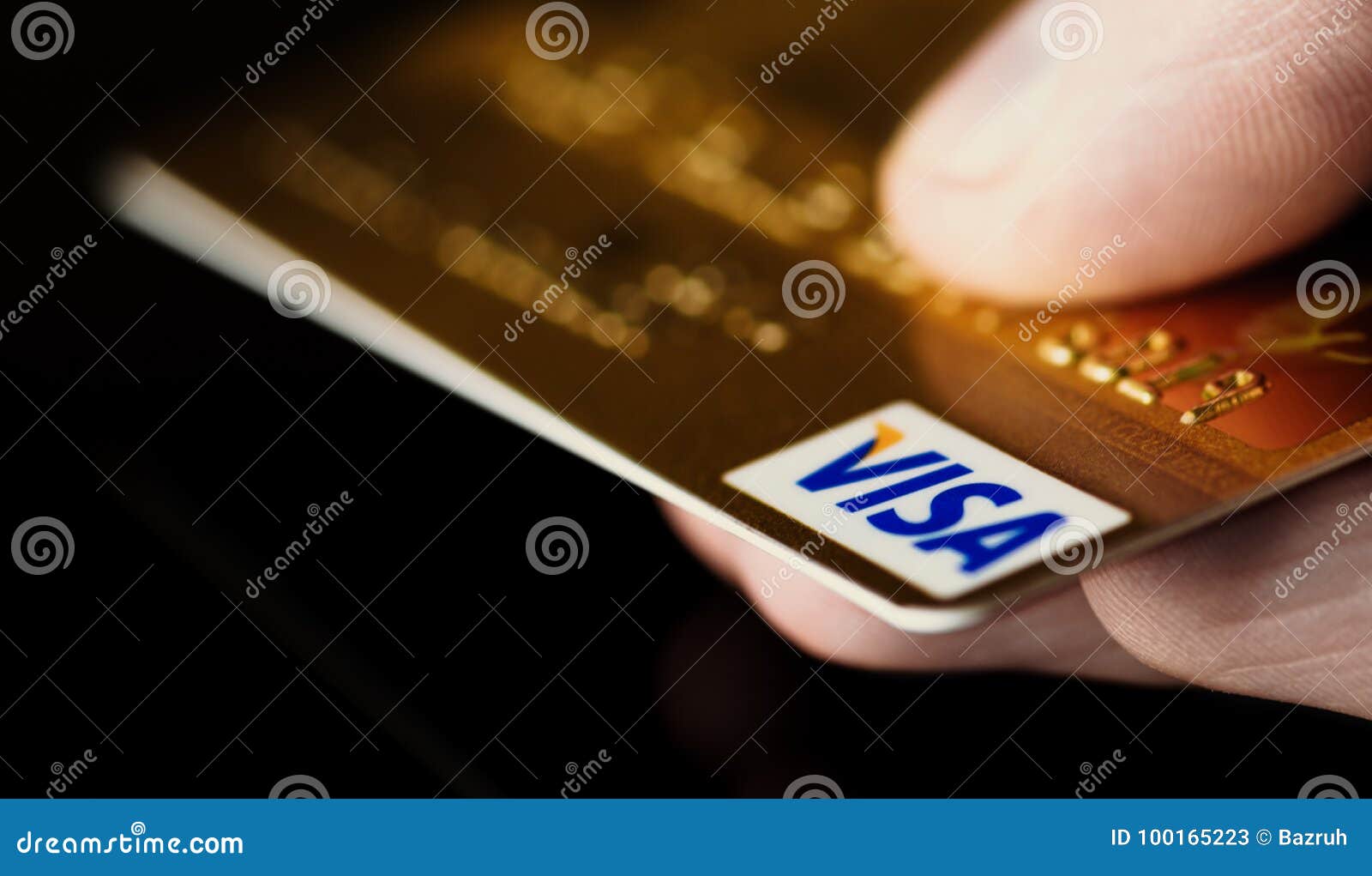 VISA card in hand editorial stock photo. Image of banking - 100165223