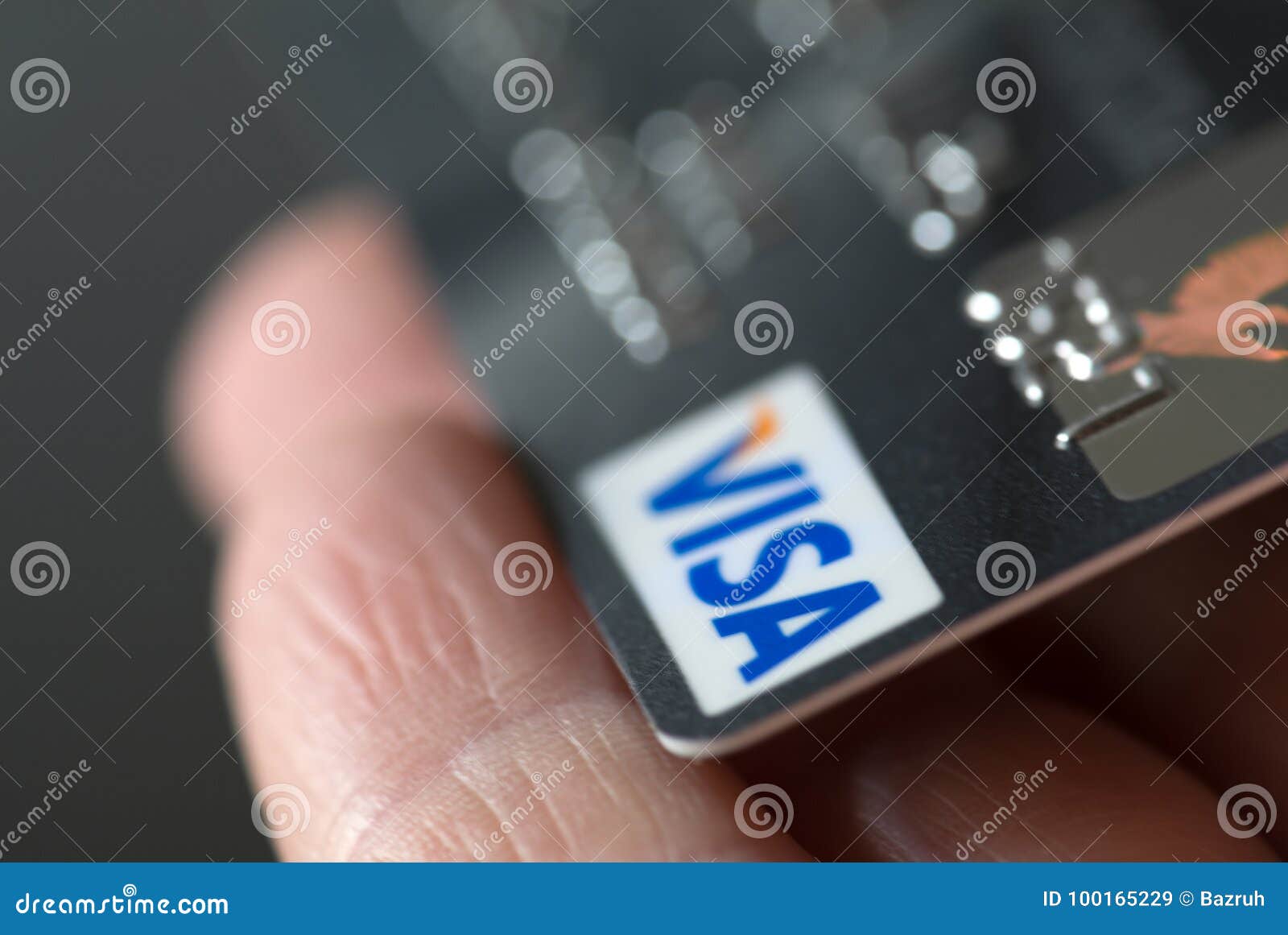 VISA card in hand editorial stock image. Image of payment - 100165229