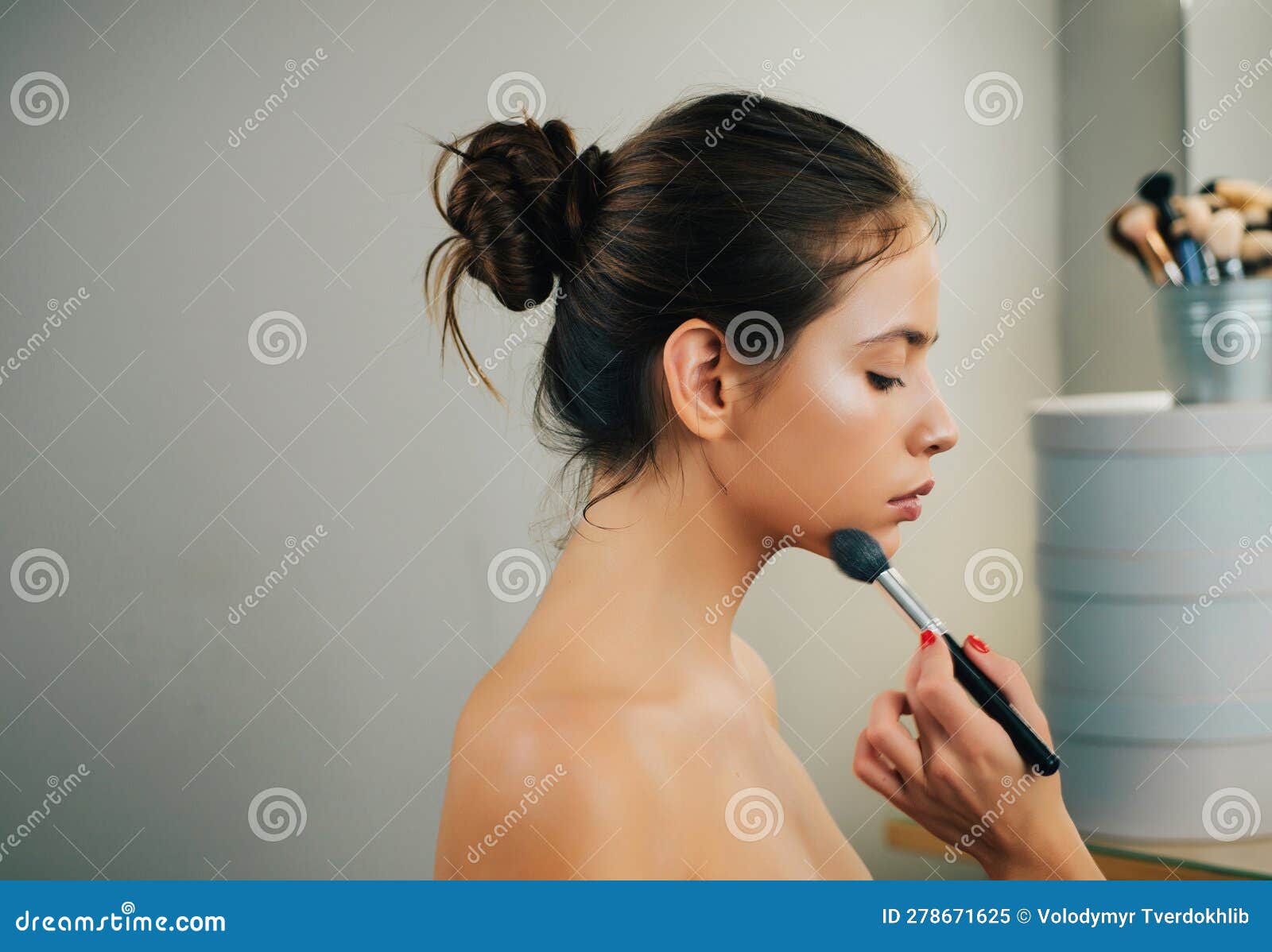 Visagist Is Doing Professional Makeup For Cute Pretty Girl With Bare